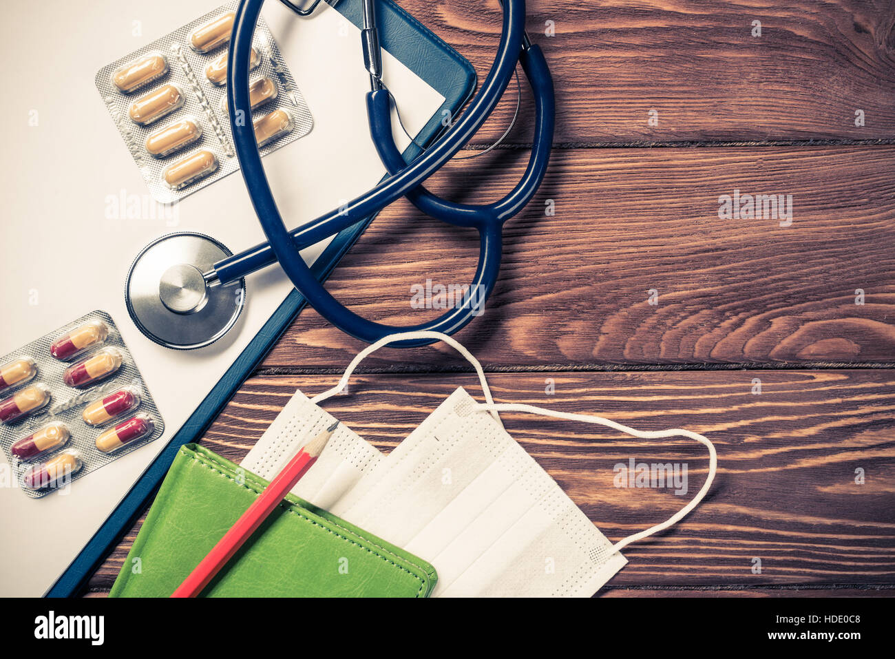 Desk of doctor with medicine things Stock Photo - Alamy