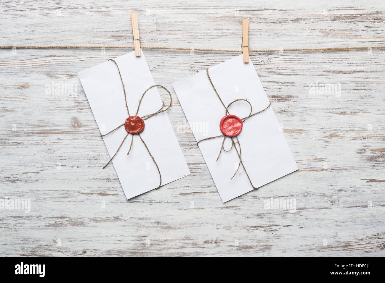 Mail envelope on rope Stock Photo - Alamy