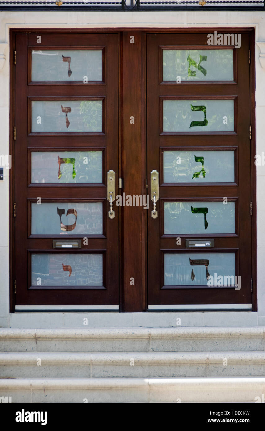 A synagogue in Crown Heights Brooklyn, New York with a door with glass ...