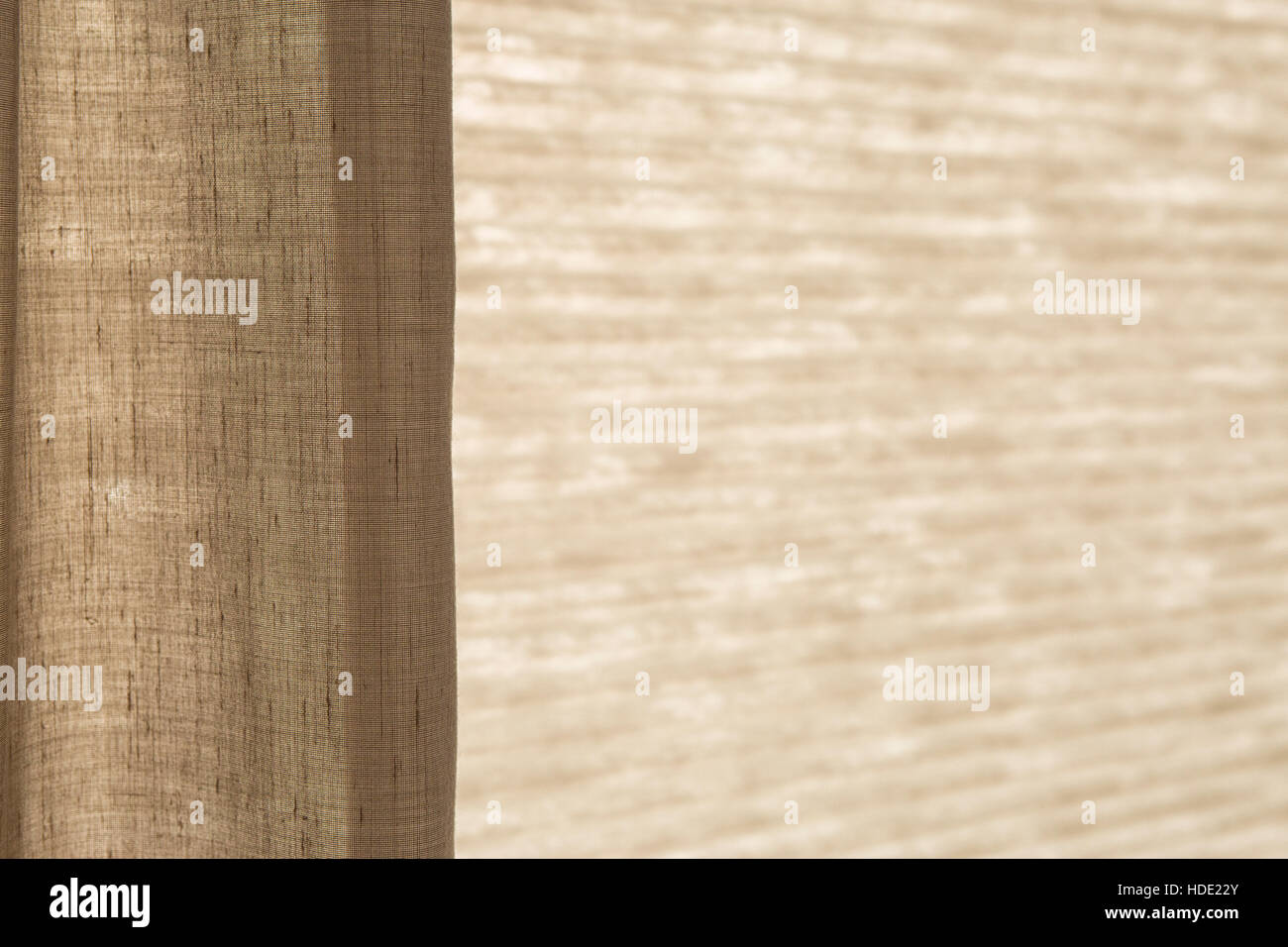 Sunlight behind the blinds and a curtain on the window Stock Photo - Alamy