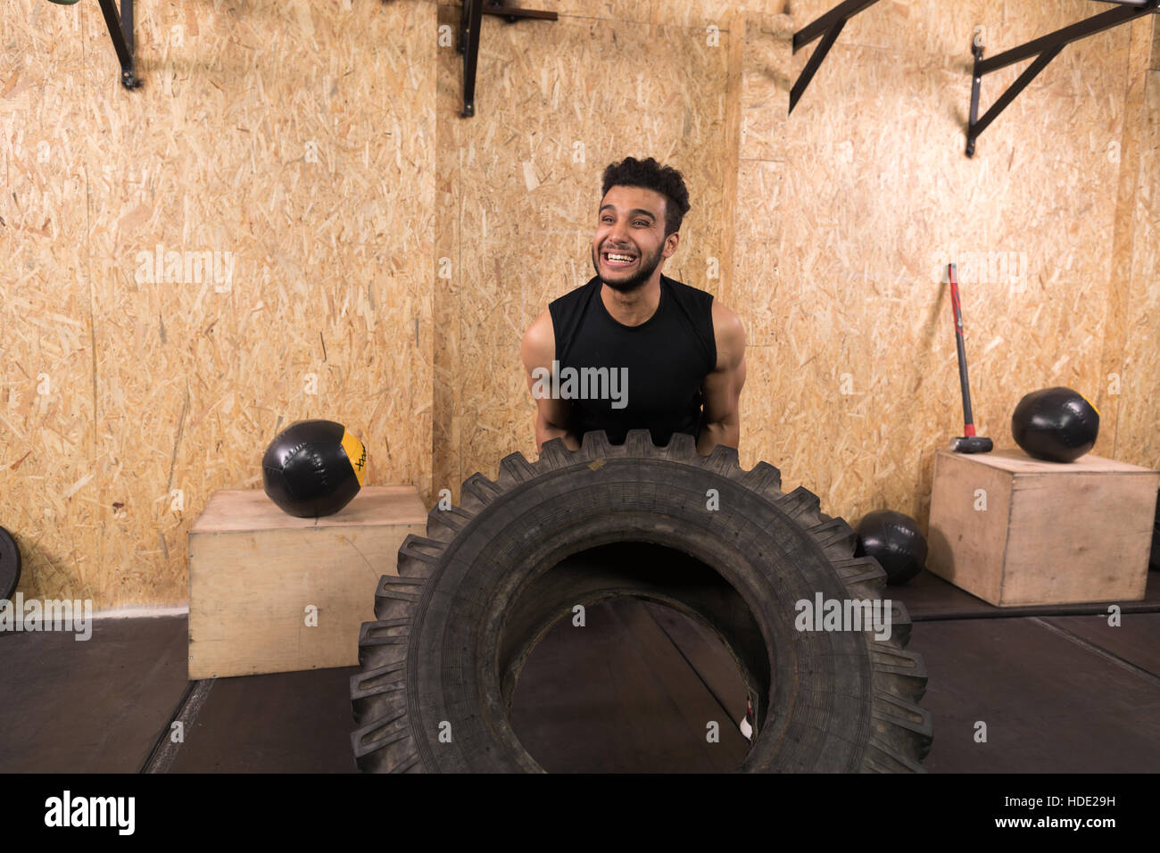 Sport Fitness Man Flipping Wheel Tire Crossfit Training, Young Healthy ...