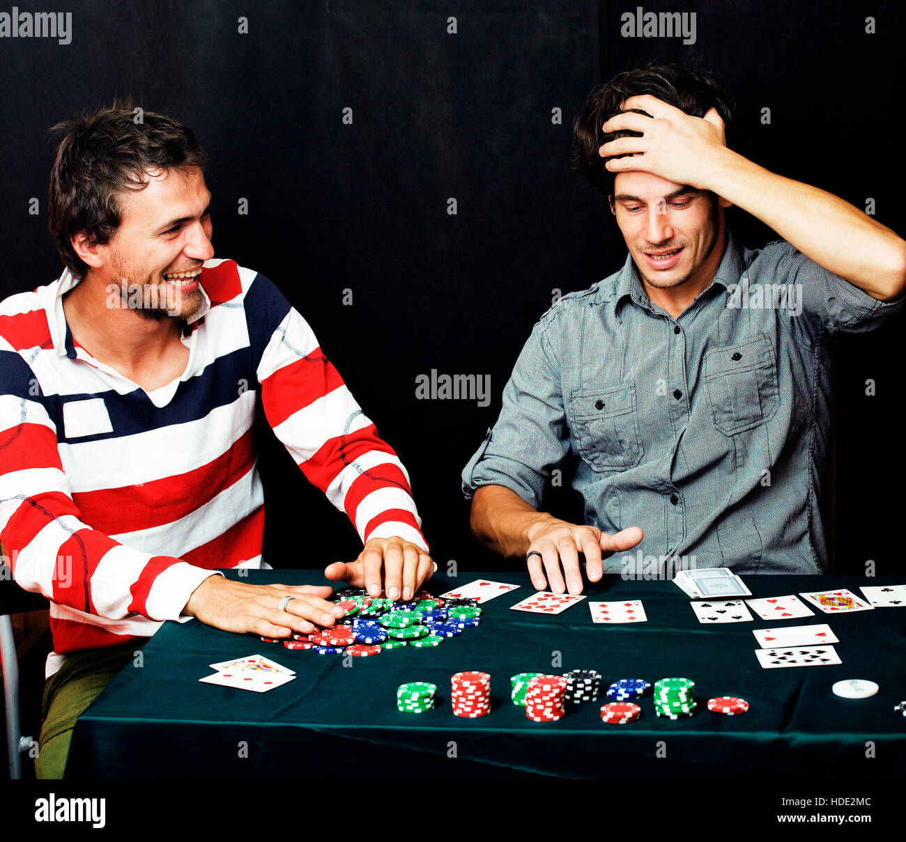 young people playing poker Stock Photo - Alamy