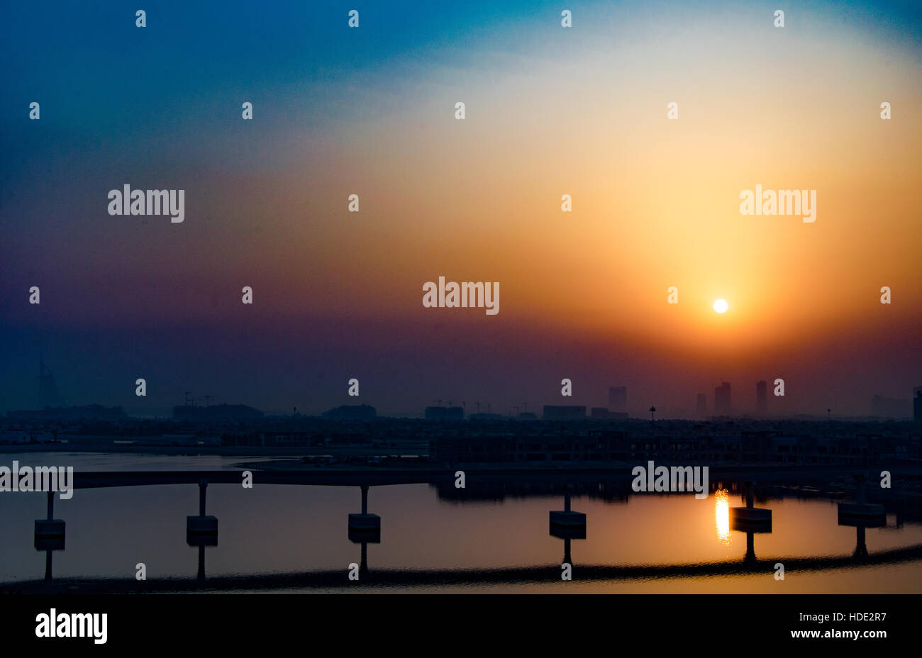 Sun rise in Dubai seen from the Palm Stock Photo - Alamy