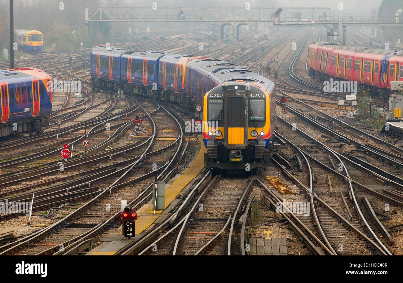 A South West Trains Class 450 train passes through Clapham Junction ...