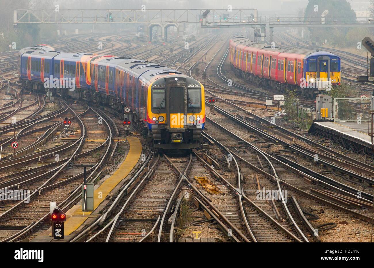 A South West Trains Class 450 train passes through Clapham Junction ...