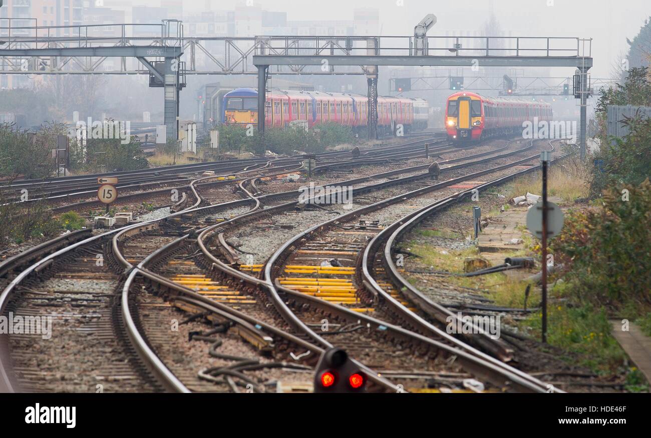 A train passes through Clapham Junction station in South West London ...