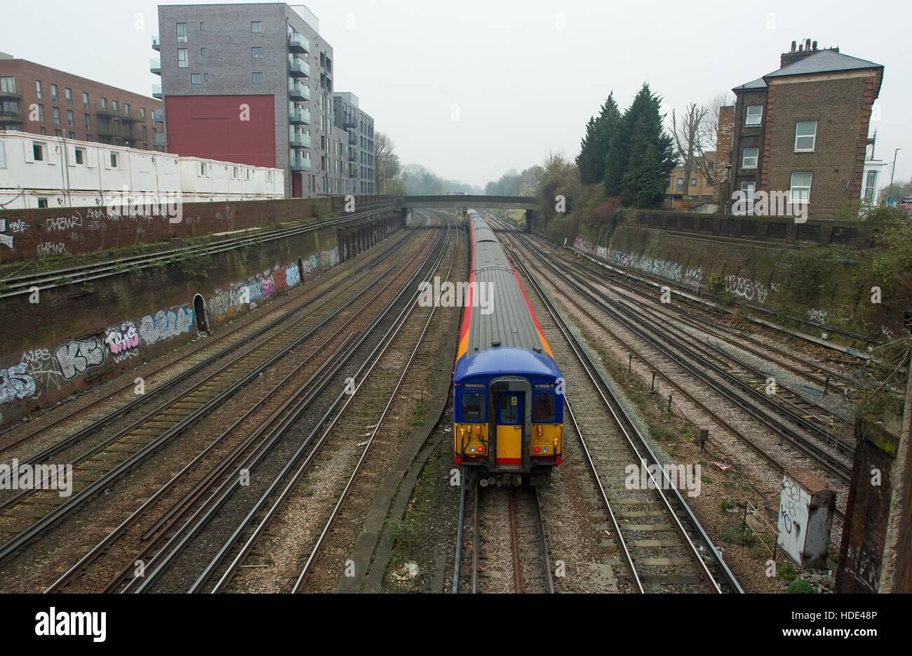 A train passes through Clapham Junction station in South West London ...