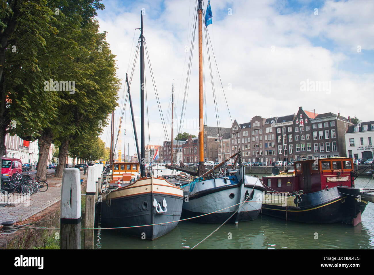 Several boats on a canal in the historical center of Dordrecht ...