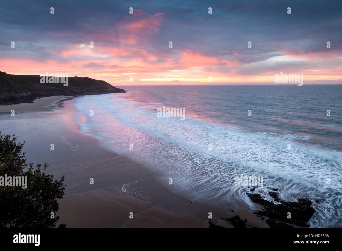 Caswell Bay sunrise Stock Photo - Alamy