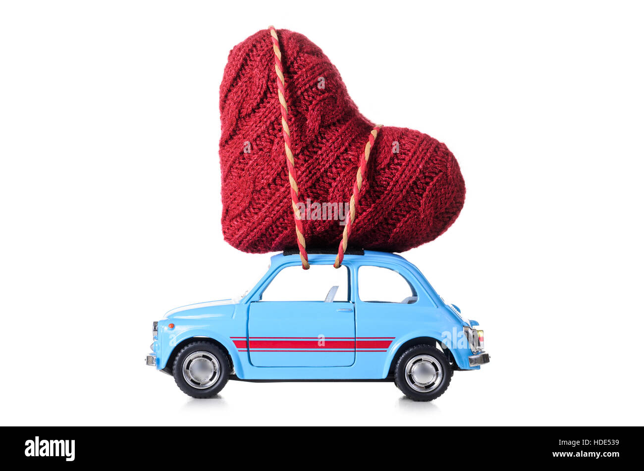 Red toy car carrying Cut Out Stock Images & Pictures - Alamy