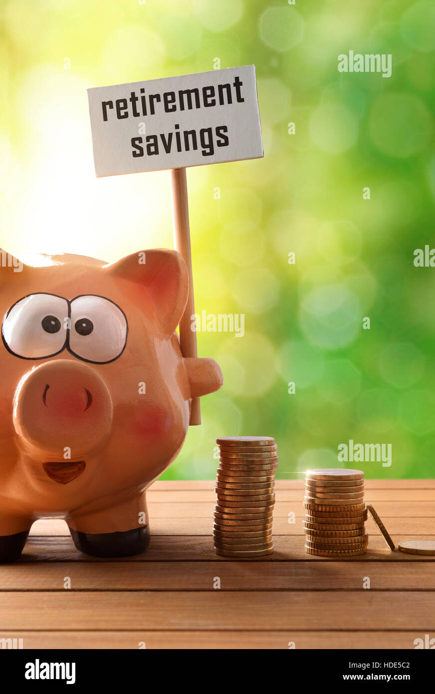 Concept retirement savings with piggy bank and coins. Piggy bank with ...