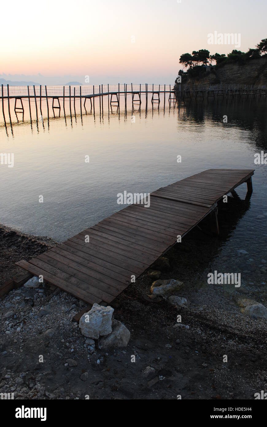 Pier leading to sea hi-res stock photography and images - Alamy