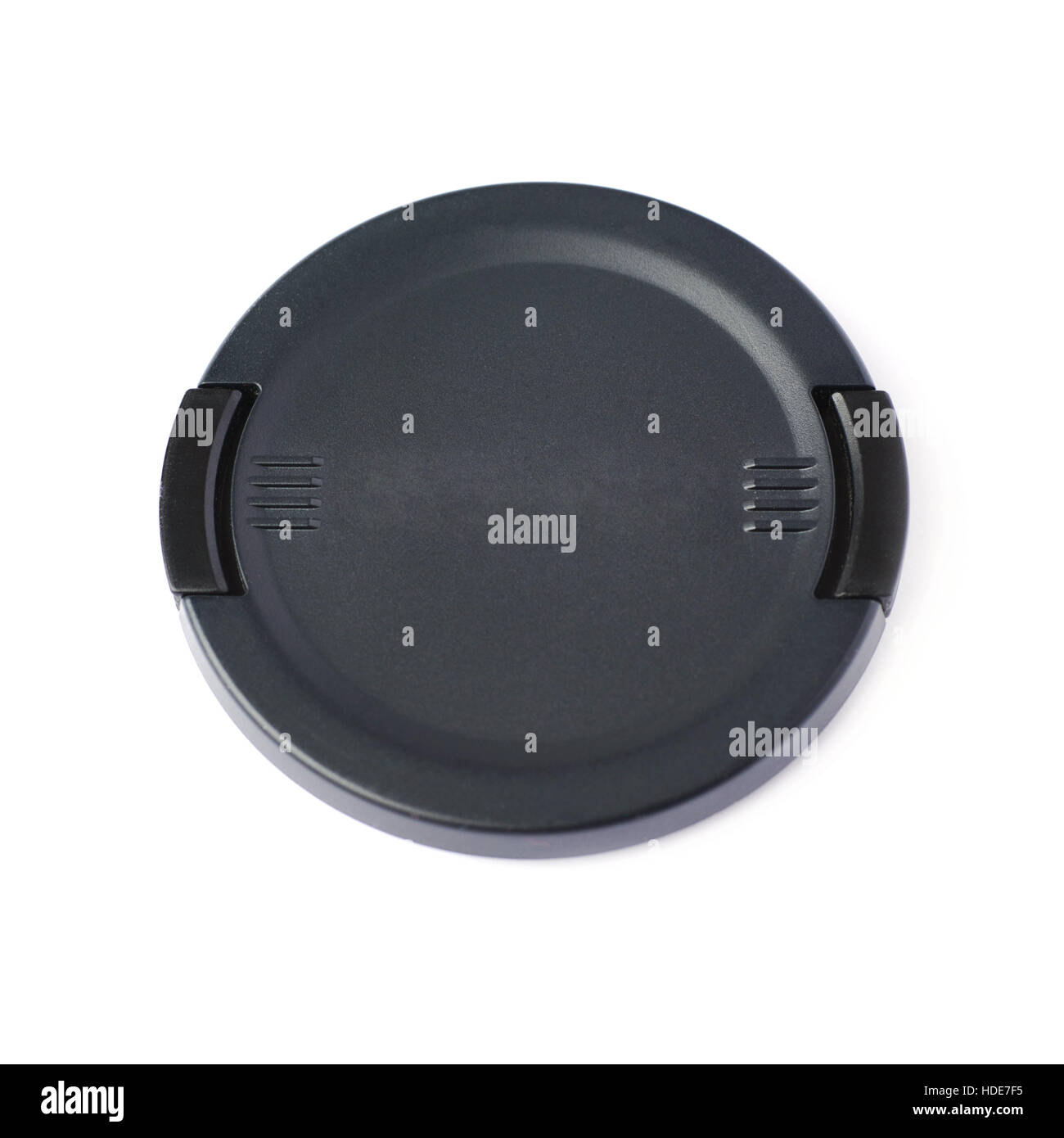 Camera lens cap isolated over white background Stock Photo - Alamy