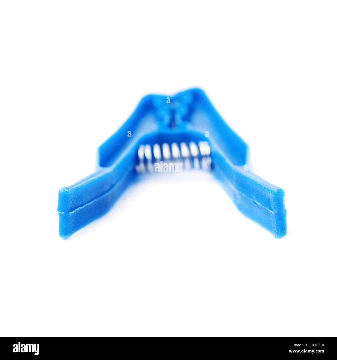 Single plastic cloth peg isolated over white background Stock Photo - Alamy