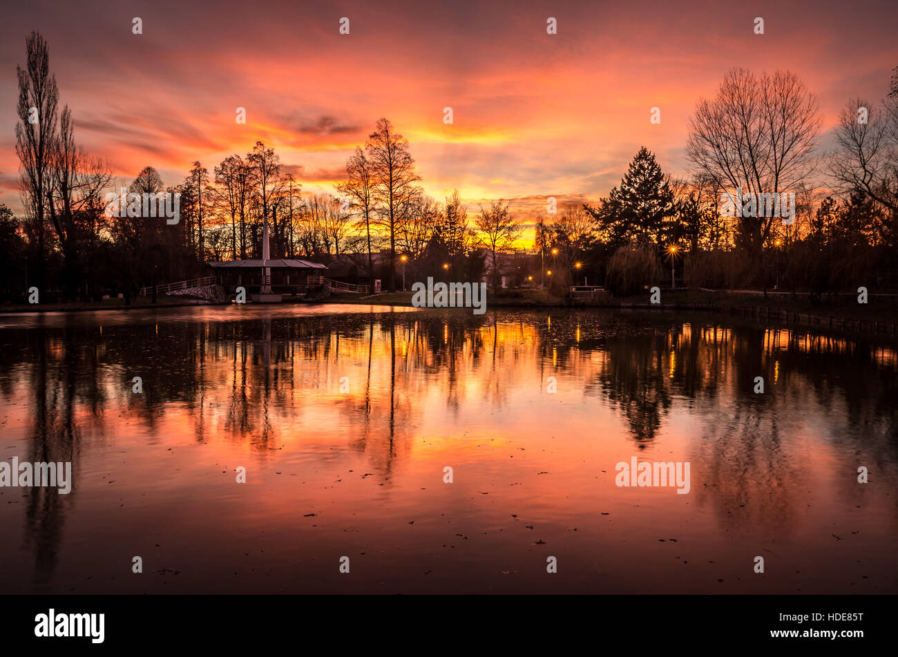 Beautiful autumn landscape. Sunset over a forest lake Stock Photo - Alamy