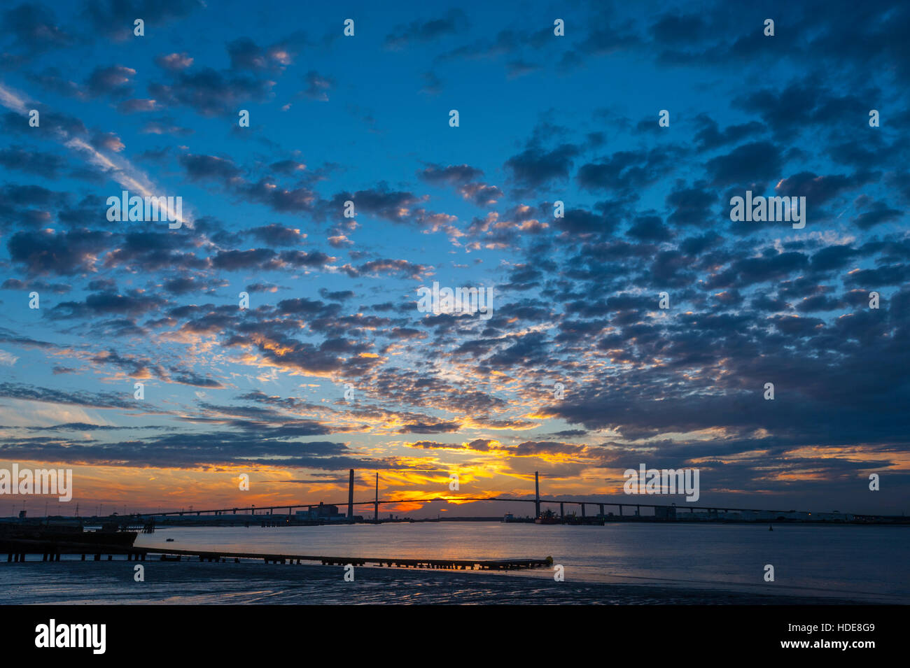 The dartford crossing bridge at sunset from the promenade at Greenhithe ...