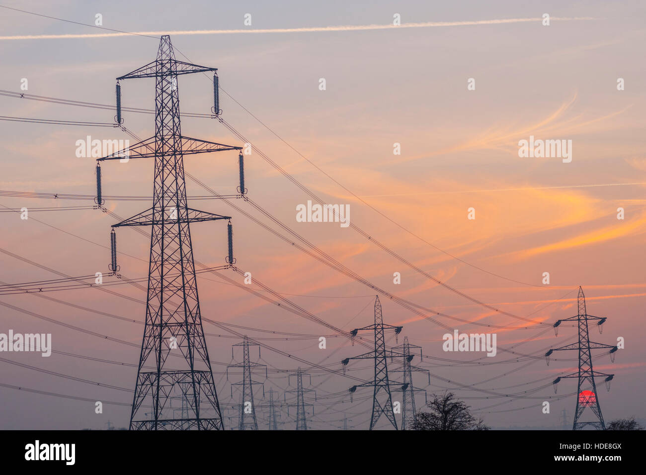 Electricity pylons sunset uk hi-res stock photography and images - Alamy