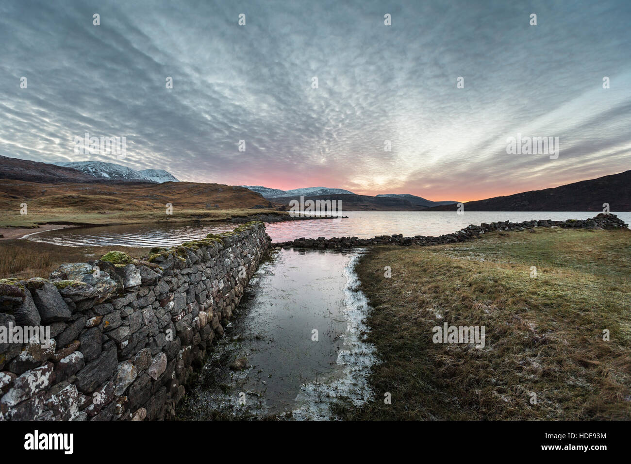 Dawn over Loch Assynt in the Scottish Highlands Stock Photo - Alamy