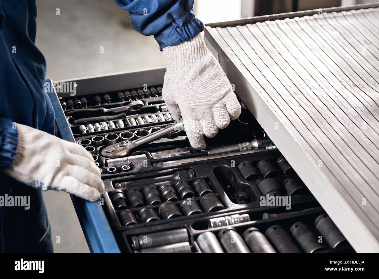 Auto mechanic with working tools For repair and diagnostics of cars in ...