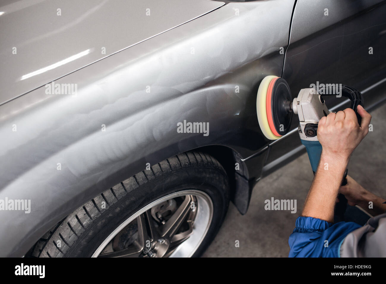 man polishing cleaning car with microfiber cloth, detailing or valeting ...