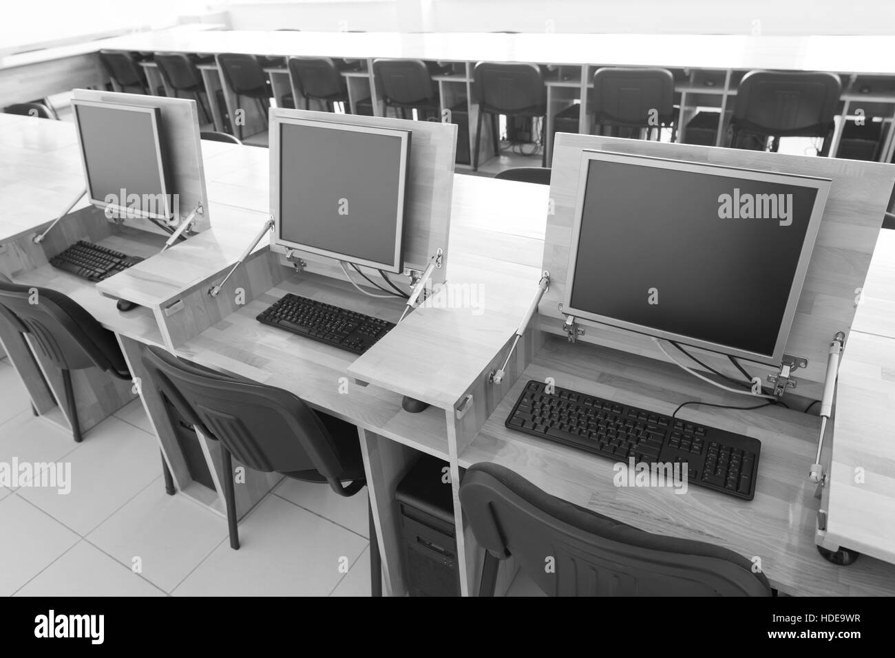 Workplace room with computers in row Stock Photo - Alamy