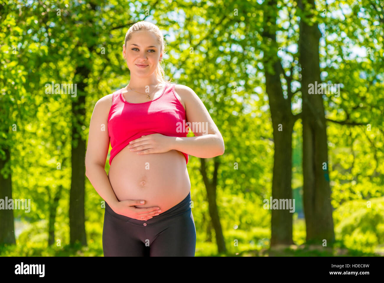Happy pregnant woman big belly hi-res stock photography and images - Alamy
