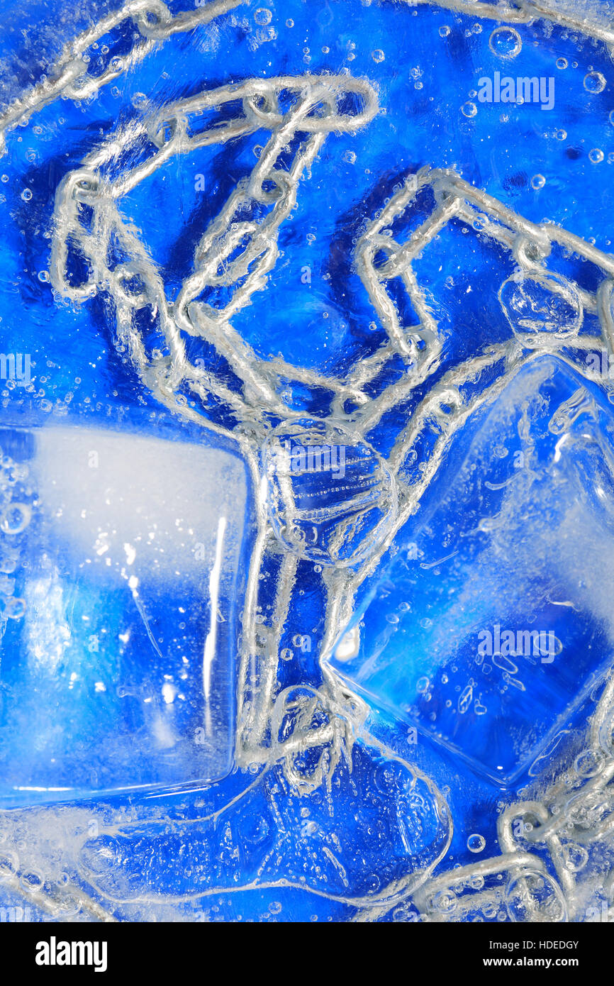 Metal chain under frozen water with ice against blue background Stock ...