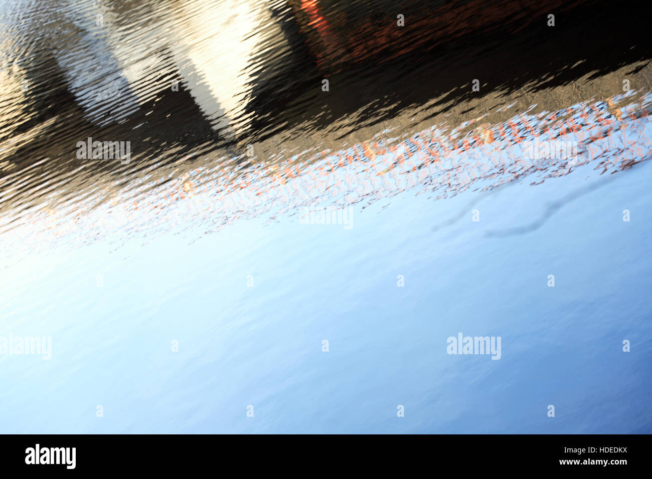 Abstract water surface of river with construction reflection Stock ...
