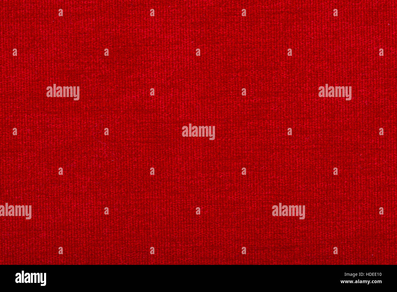 Natural linen fabric for embroidery. Red color Stock Photo - Alamy