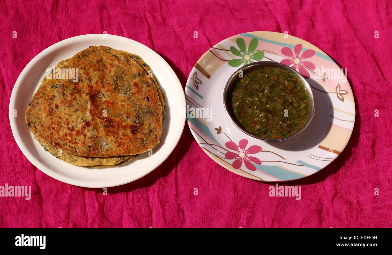 Methi Paratha with Indian homemade traditional green chilli sauce Stock ...