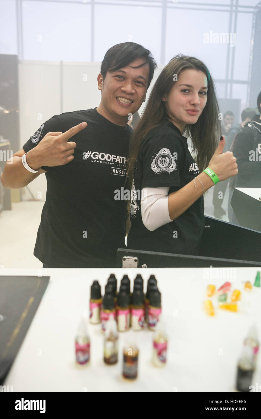 MOSCOW - 9 DECEMBER,2016: International Vape Expo.People at big vaping ...