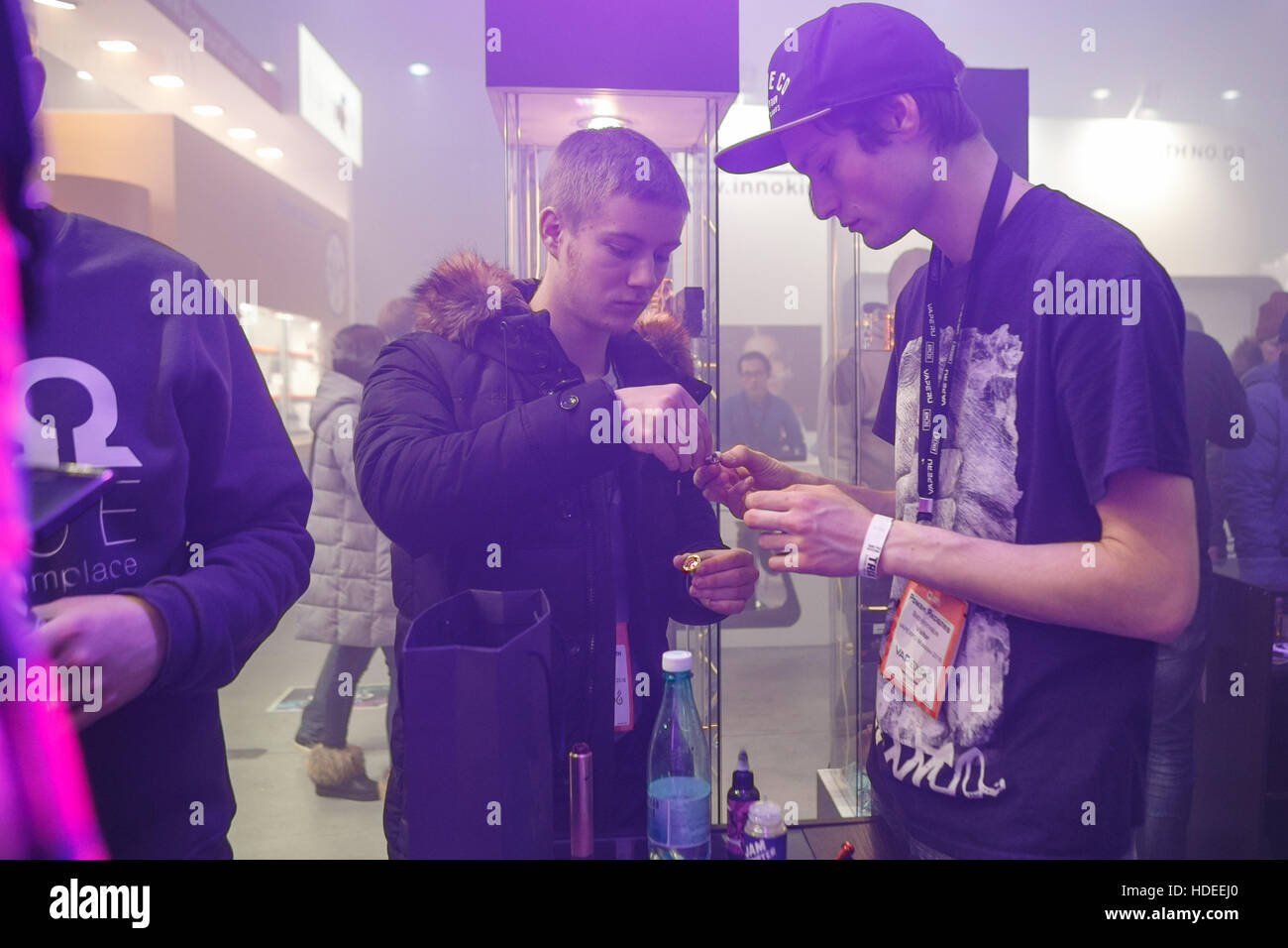 MOSCOW - 9 DECEMBER,2016: International Vape Expo.People at big vaping ...