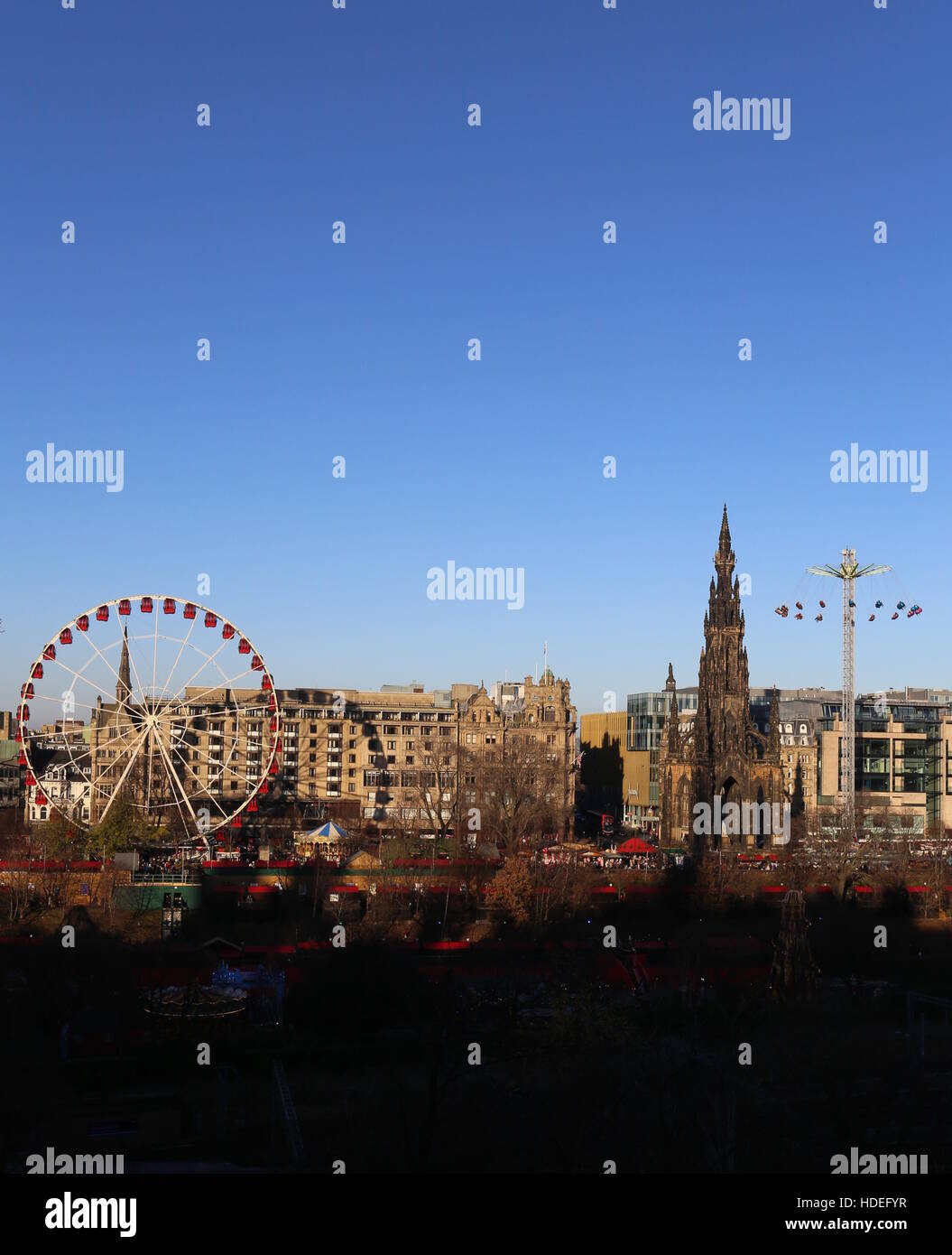 Ferris wheel, Scott Monument and Star Flyer ride Edinburgh Scotland ...