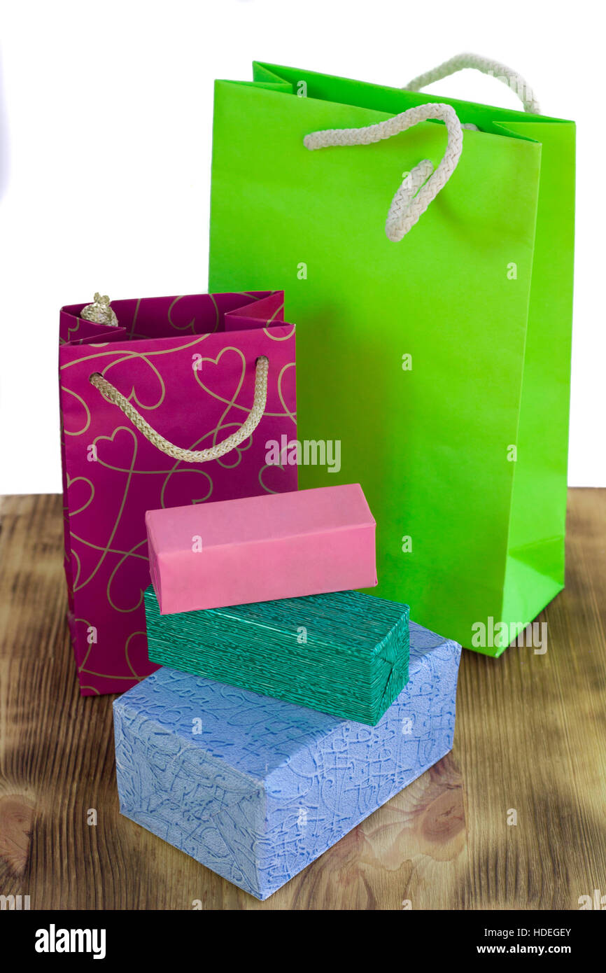 Colourful and bright shopping packages and boxes for gifts and presents ...