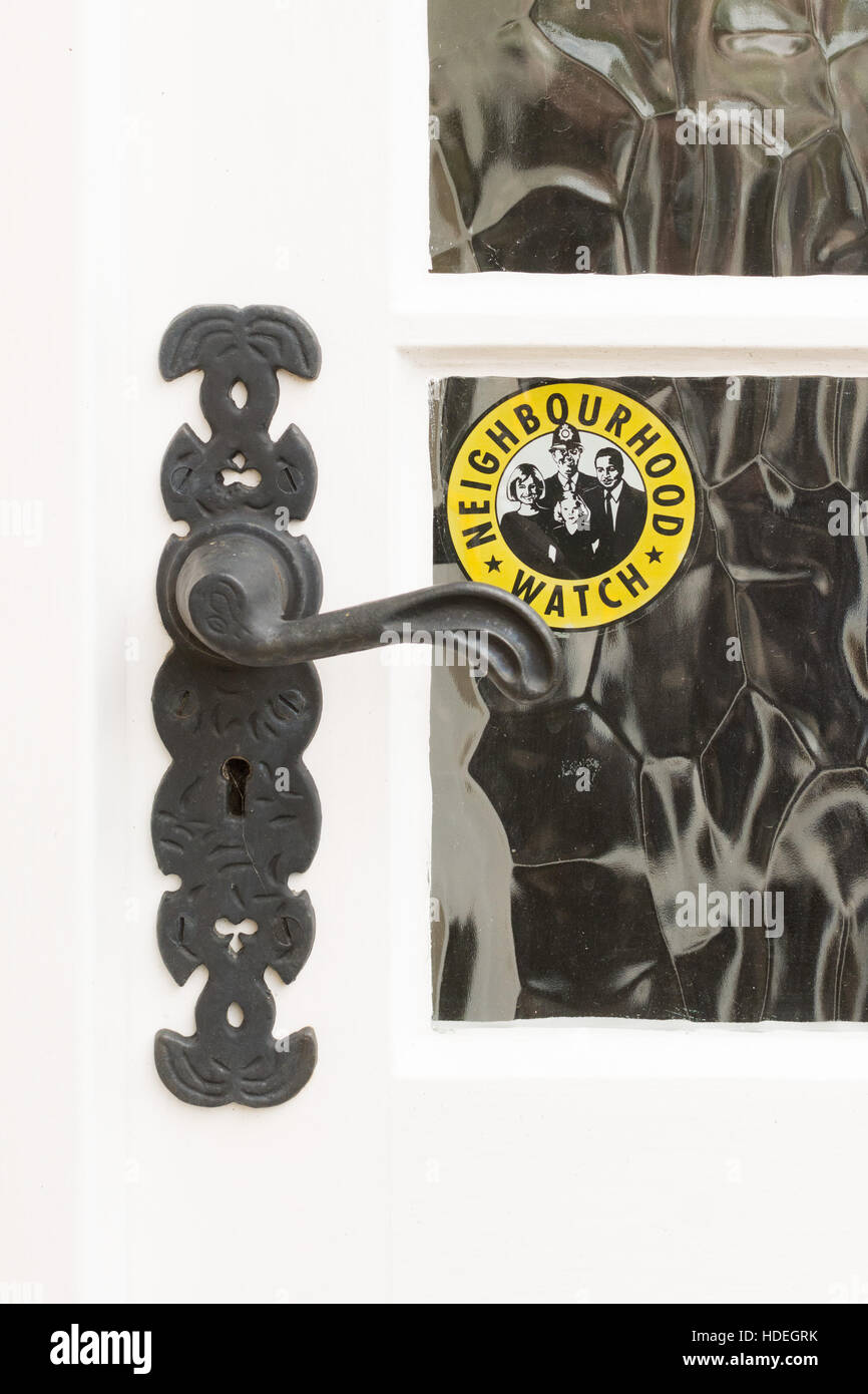 neighbourhood watch sticker on front door Stock Photo - Alamy