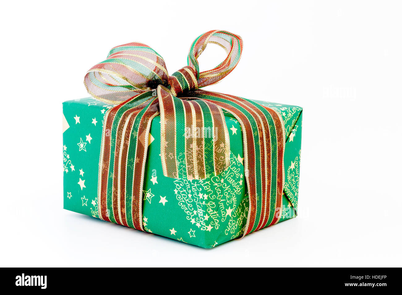 red and green Christmas gift with ribbon isolated Stock Photo - Alamy