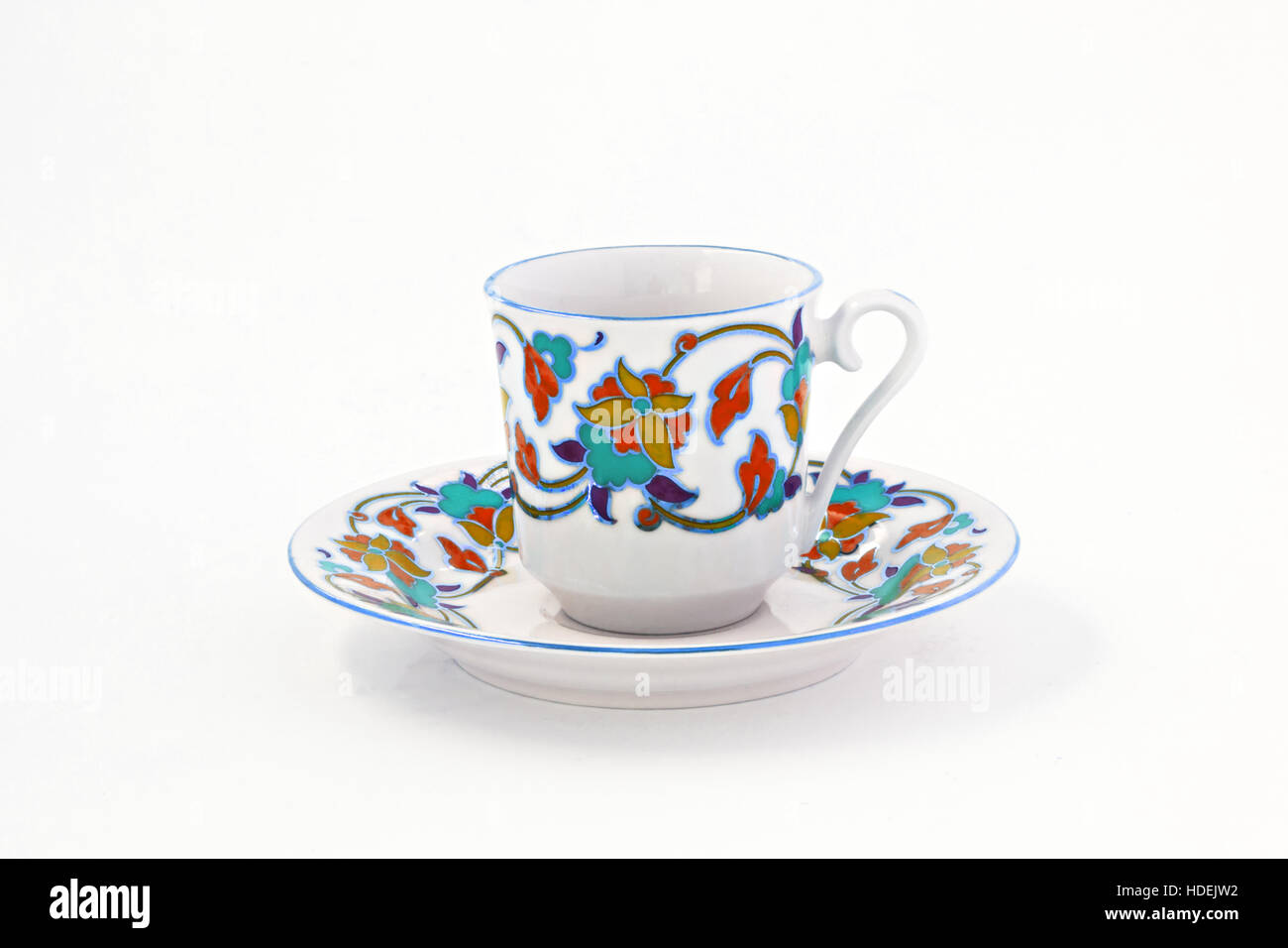 vintage coffee set with colorful decoration isolated Stock Photo - Alamy