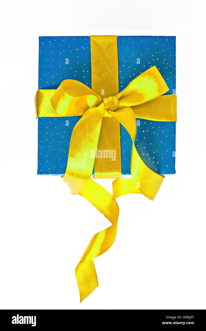blue and yellow Christmas gift with ribbon isolated Stock Photo - Alamy