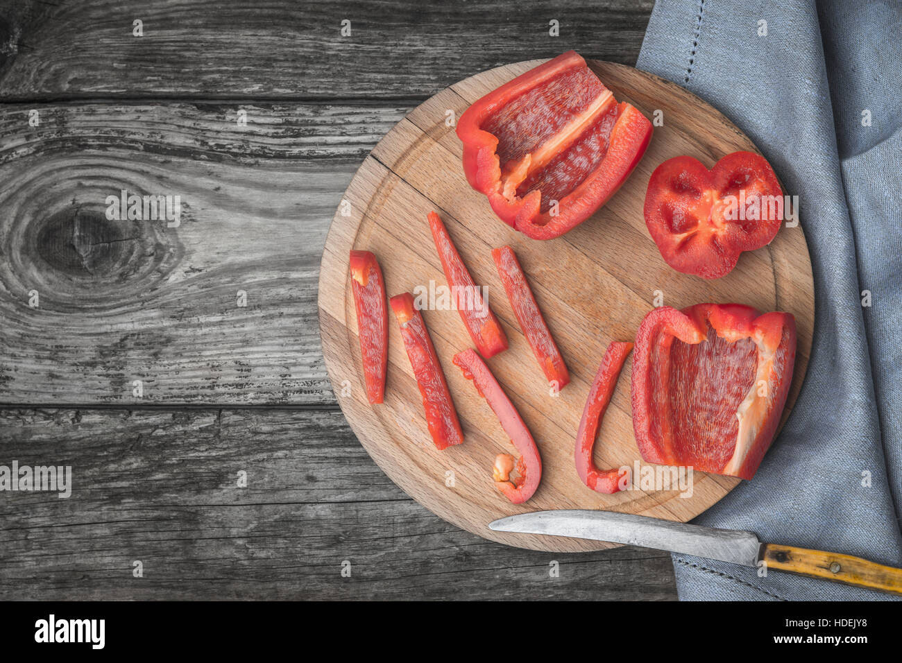 Sliced bell pepper on the wooden table top view Stock Photo - Alamy