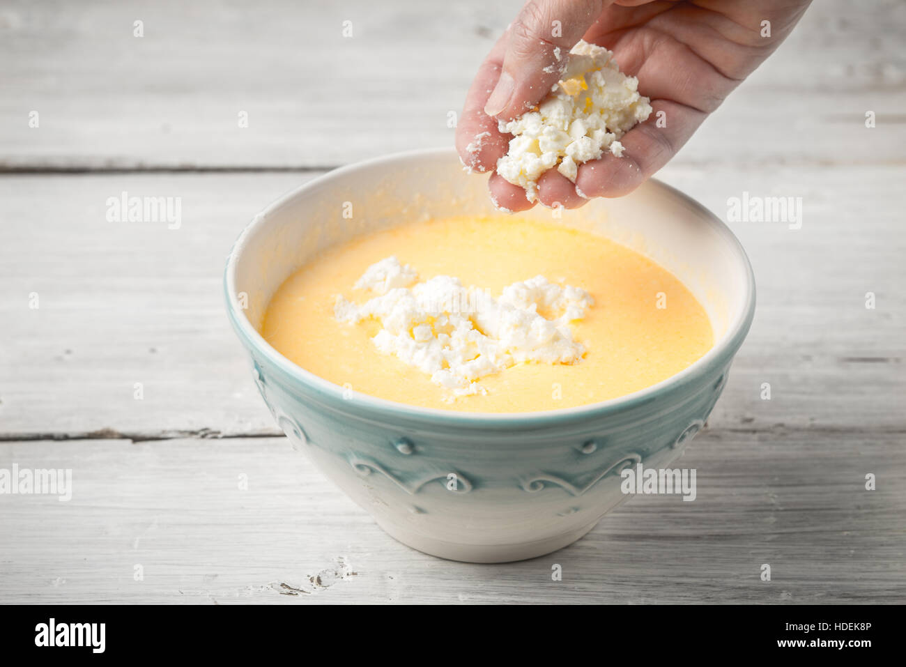 Adding topping hi-res stock photography and images - Alamy