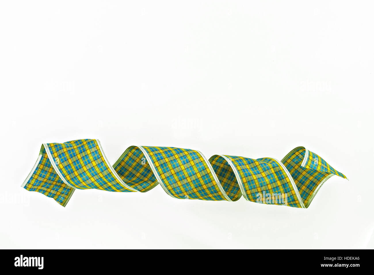 Green decorative packing tape isolated in a cage Stock Photo - Alamy