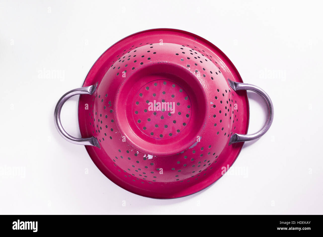 Old metal colander sieve isolated on white background Stock Photo - Alamy