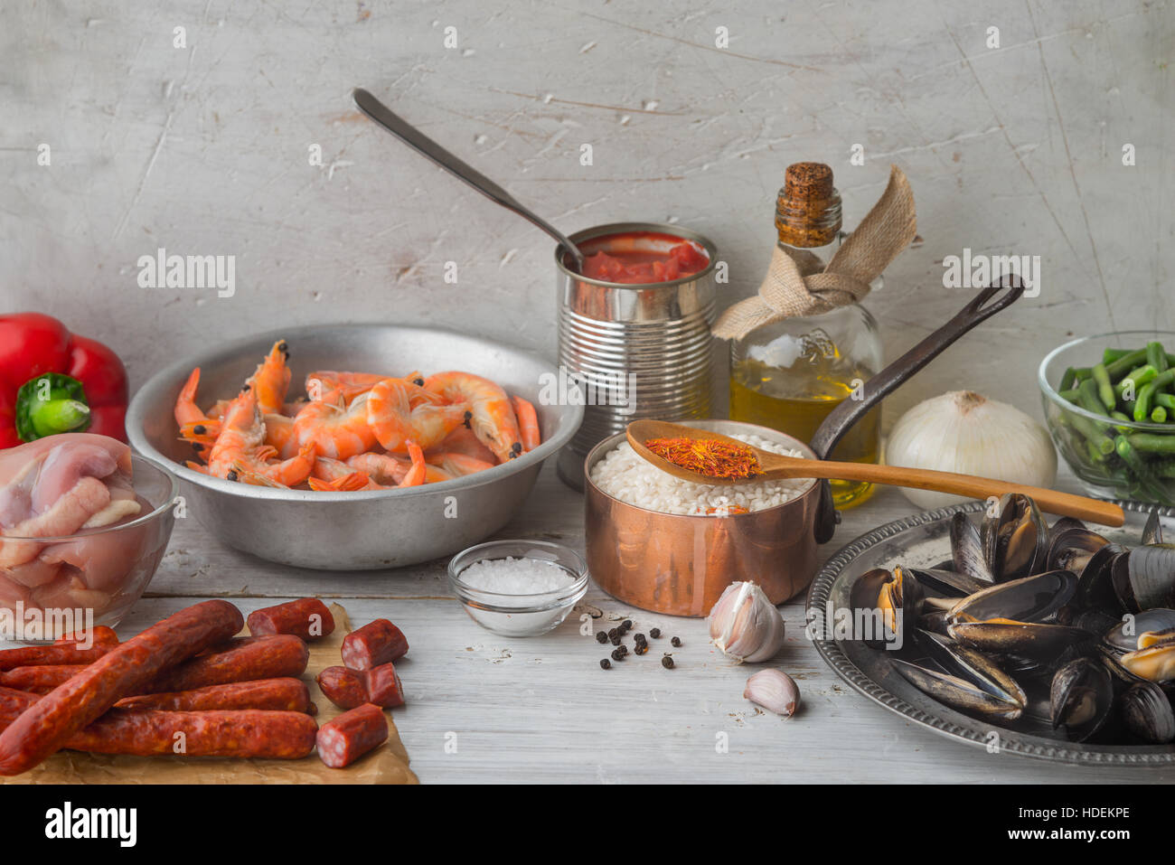 Ingredients for paella on the white scratched table horizontal Stock ...