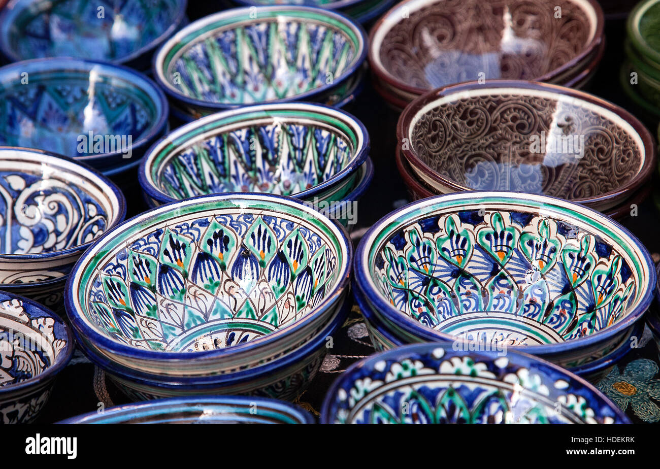 Traditional ceramic dishware in a street market, Uzbekistan Stock Photo ...