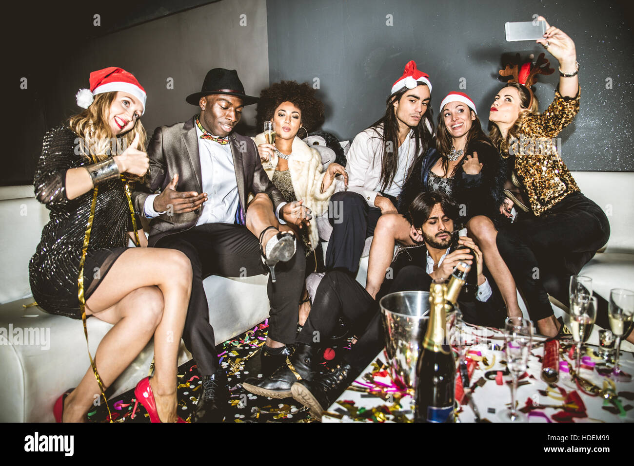 Multi-ethnic group of friends celebrating the end of the year in a ...