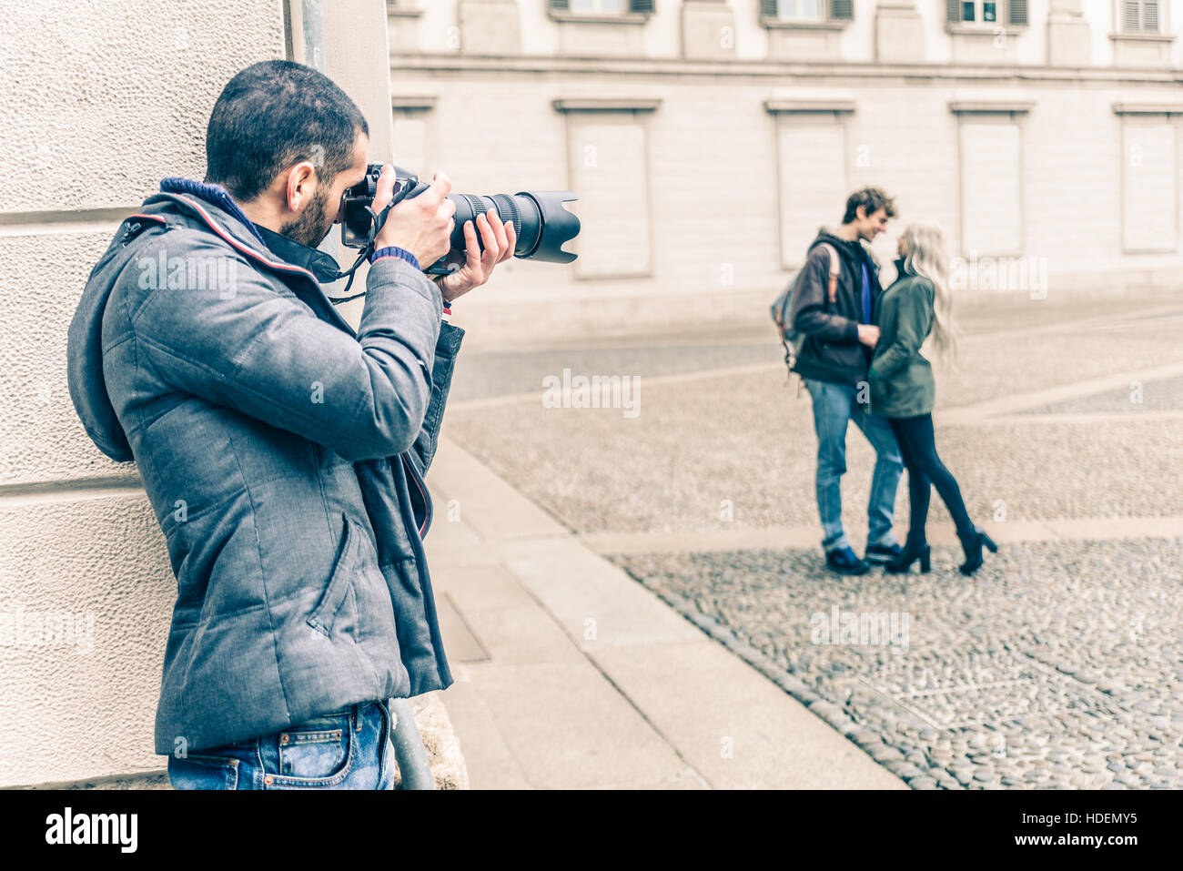 Reporter photographing a famous vip couple on a romantic date ...