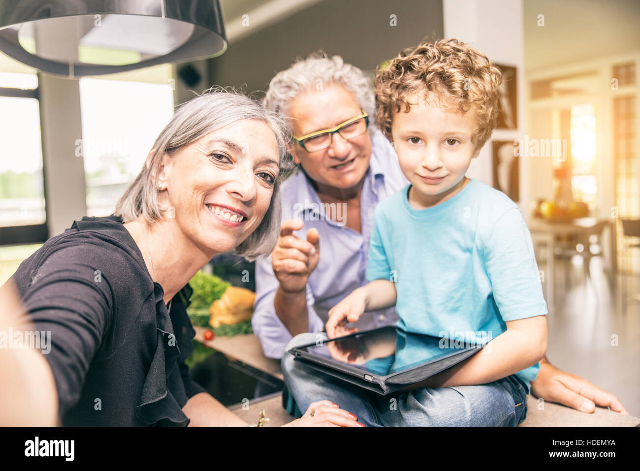 Grandmother grandchildren taking selfie hi-res stock photography and ...