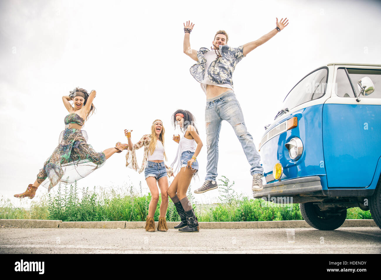 Multi-ethnic group of friends having fun on a summer road trip - Young ...