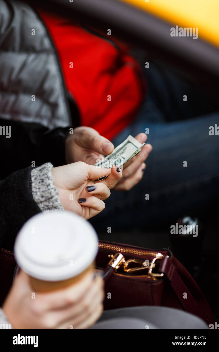 Paying taxi driver hi-res stock photography and images - Alamy