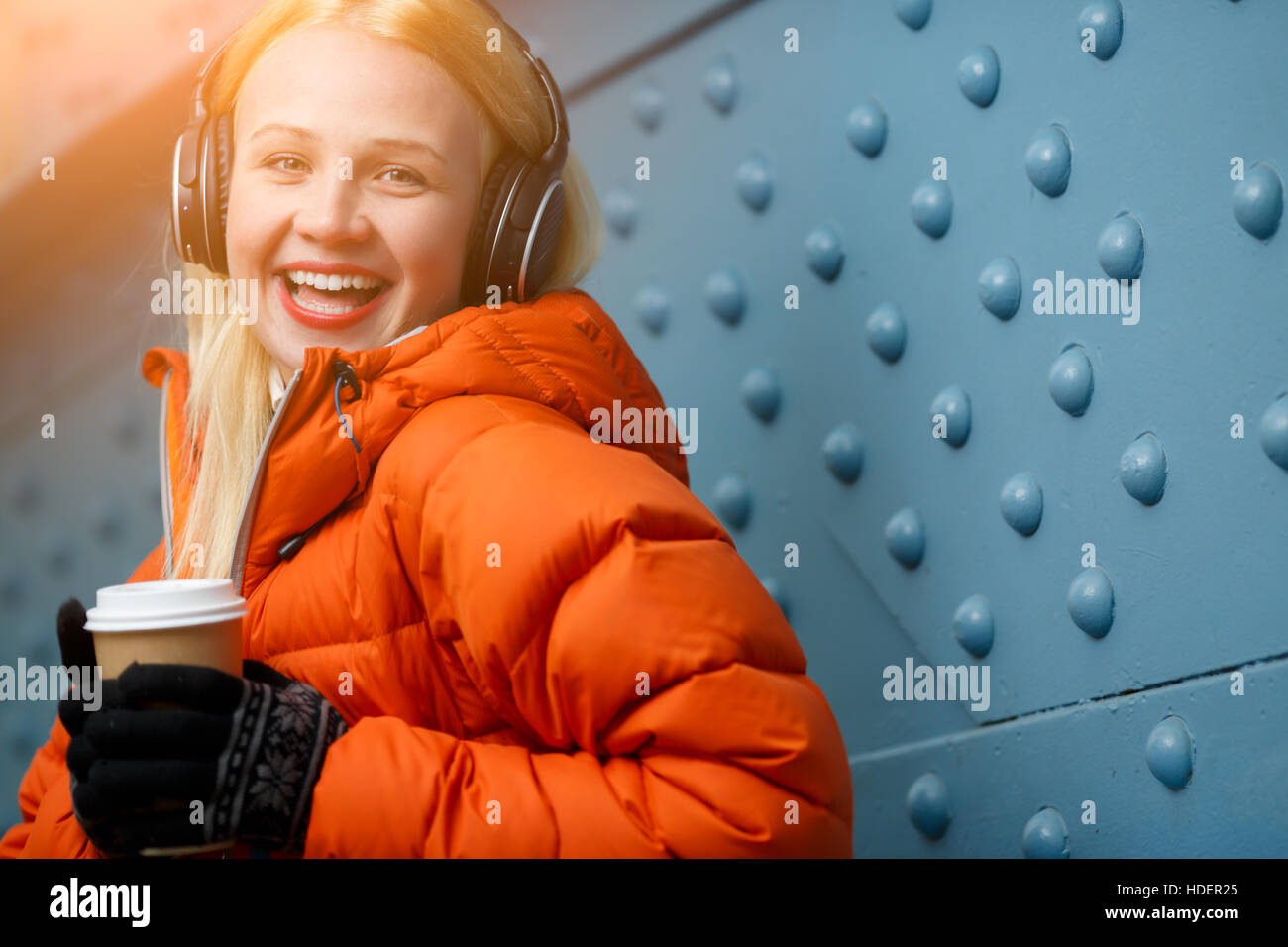 Ginger girl in orange jacket Stock Photo - Alamy